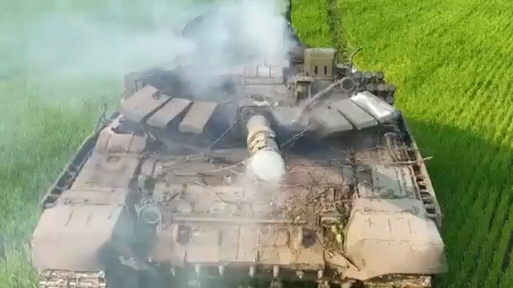 Footage Shows Russian Drone Dropping Grenade Inside a Tank - 19FortyFive